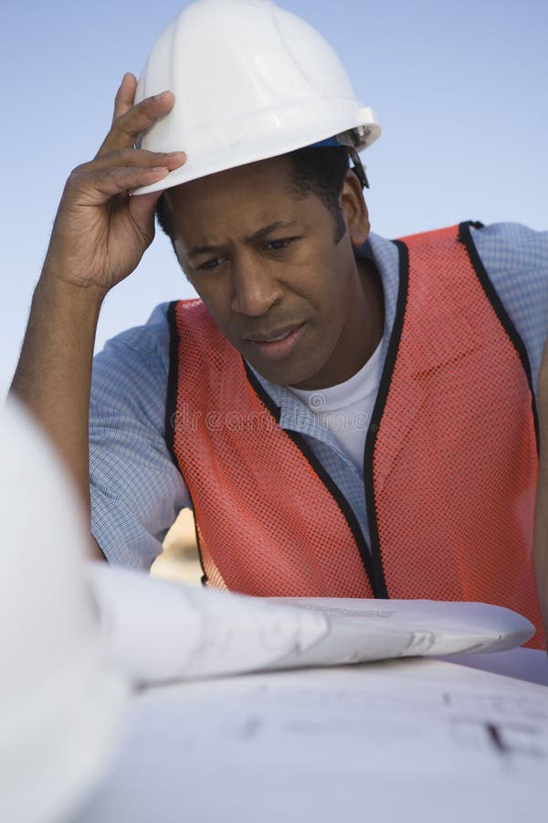 Architect Looking at Blueprint Stock Photo - Image of people, architect ...