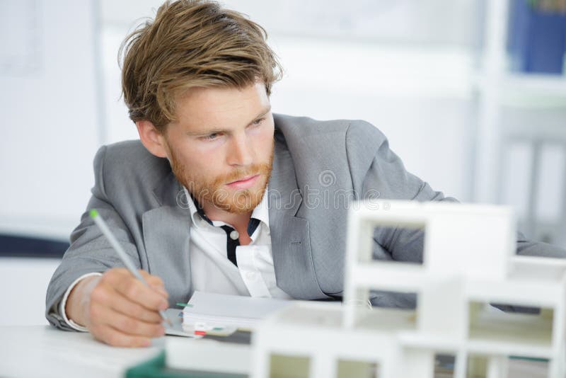 Architect Making Model Designs for Construction Stock Photo - Image of ... Architect Making Model Designs for Construction Stock Photo - Image of ...