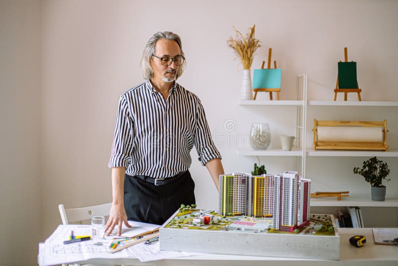 Architect Man or Designer Working with Building Model in Office Stock ...