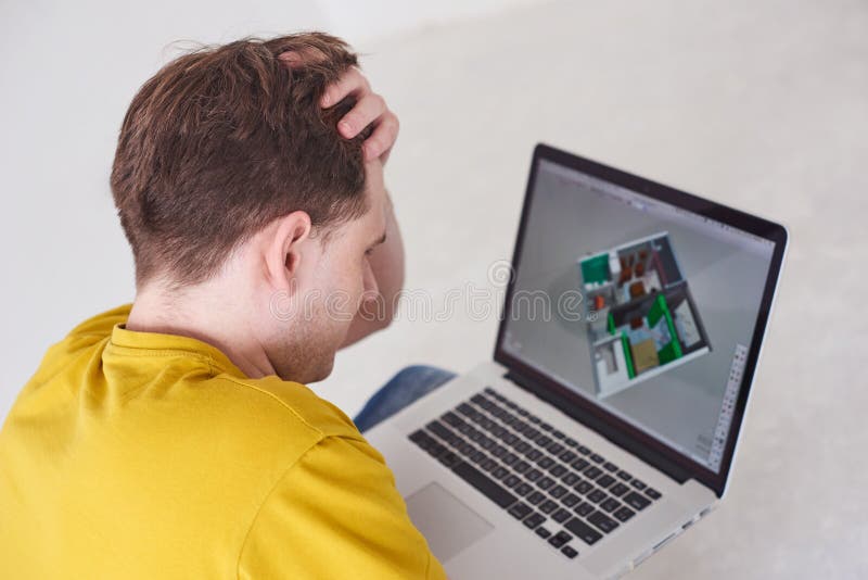 Architect Man Working with Laptop Online. Sketching a Construction ...