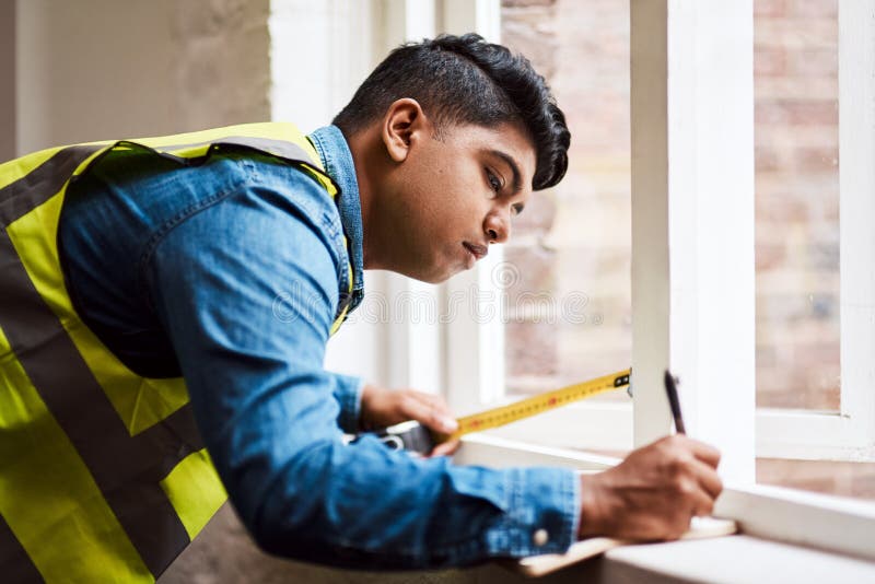 Architect, Man and Writing Measurement for Construction, Renovation or ...