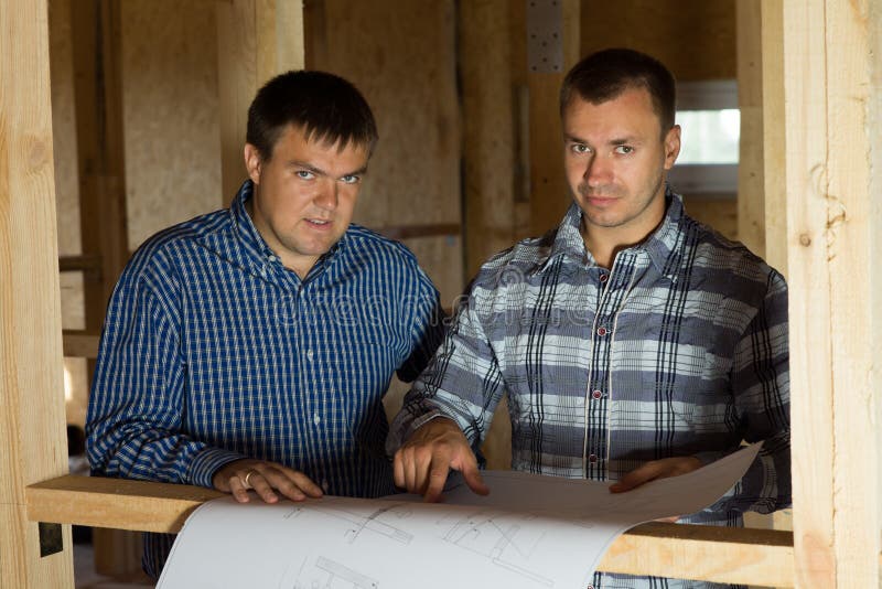 Architect Men with Blueprint Looking at Camera Stock Image - Image of ...