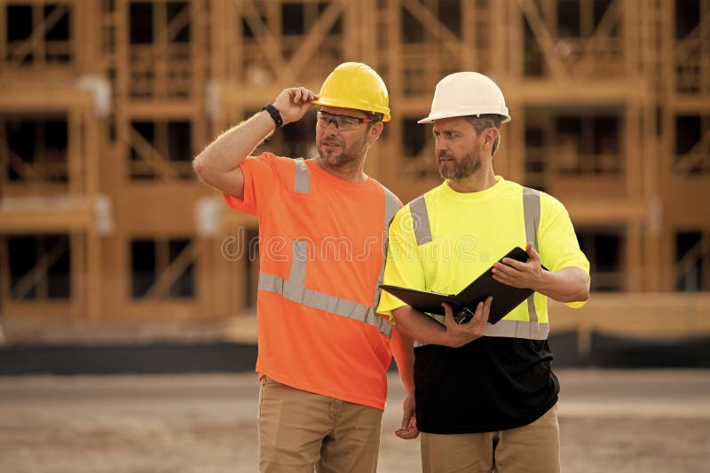 Architect Men Check Construction Project. Architect Men Discussing ...