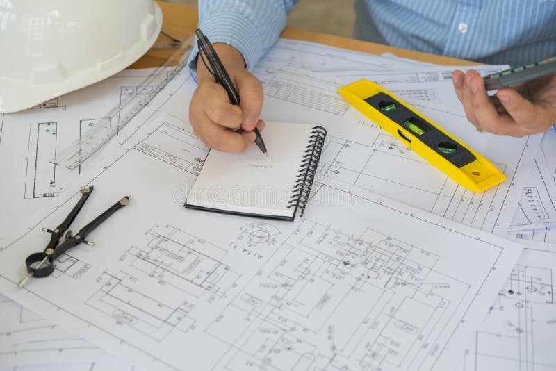 Architect or Planner Working on Drawings for Construction Plans Stock ...