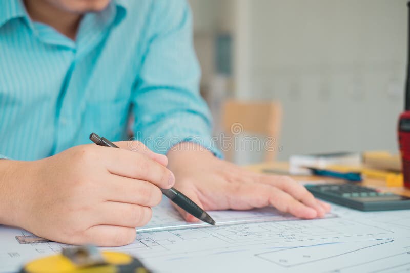 Architect or Planner Working on Drawings for Construction Plans Stock ...