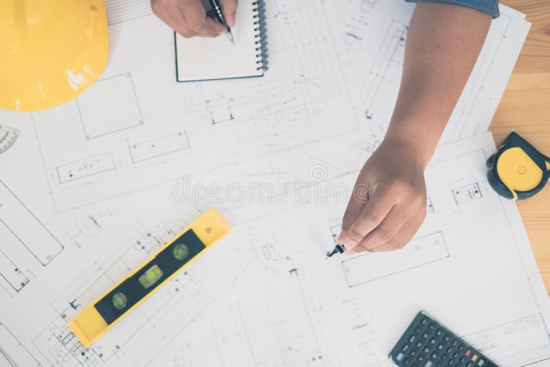 Architect or Planner Working on Drawings for Construction Stock Photo ...