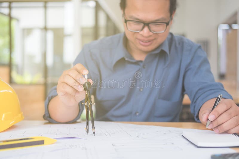 Architect or Planner Working on Drawings for Construction Stock Photo ...