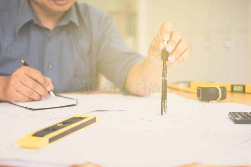 Architect or Planner Working on Drawings for Construction Stock Photo ...