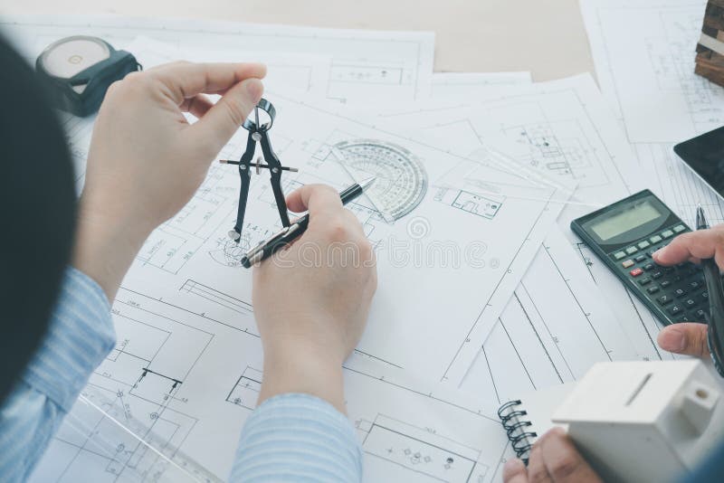 Architect or Planner Working on Drawings for Construction Stock Photo ...