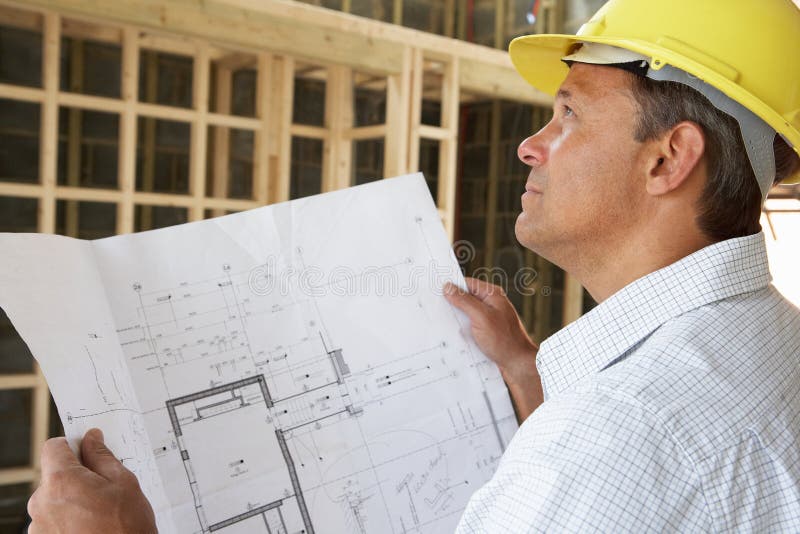 Architect with Plans stock image. Image of contractor - 16295775