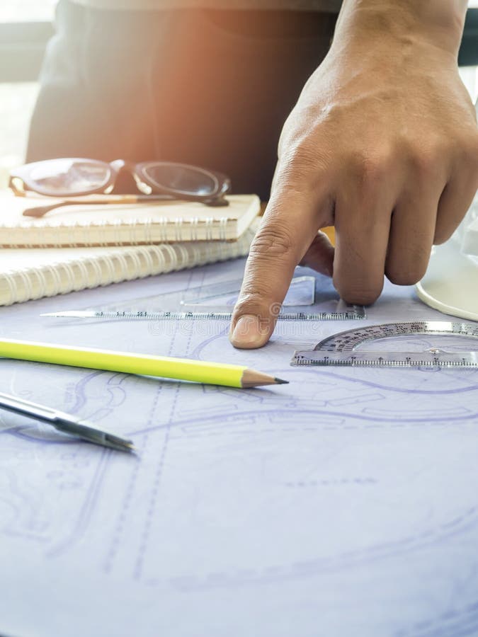 Architect Point at Blueprint Stock Image - Image of element, object ...