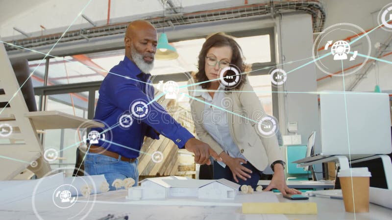 Architect and Project Manager Examining Architecture Model in Office ...