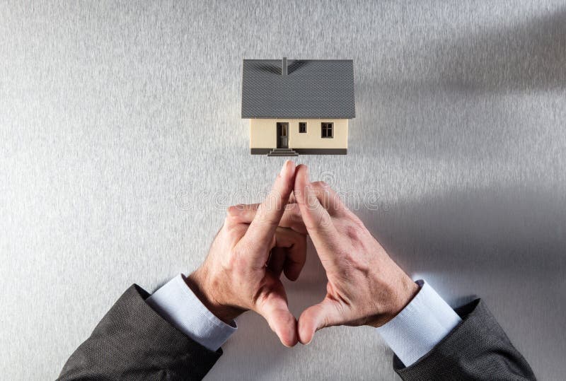 Hands of Architect or Businessman Holding House for Home Valuation ...