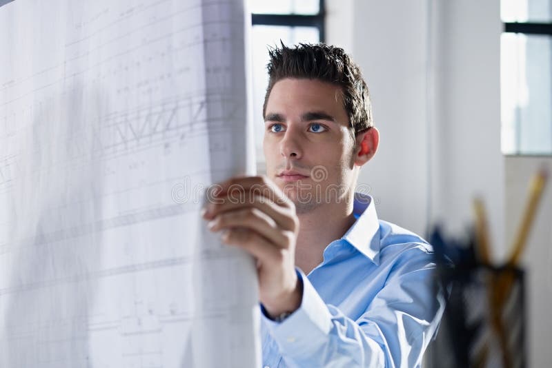 Hardhat and Blueprint on Desk Stock Photo - Image of business ...