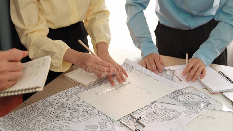 Close Up of Architect Hand Writing Detail of Blueprint with Laptop ...