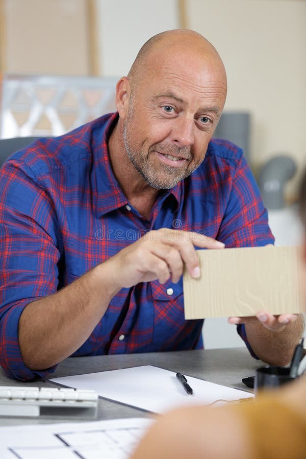 Architect Selecting Wood Finish Stock Photo - Image of discussion ...