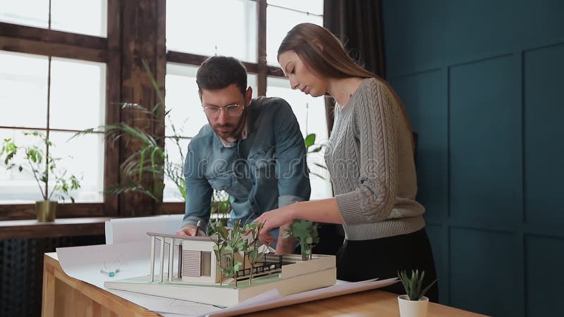 Architect Showing His House Plan To a Client. Stock Footage - Video of ...