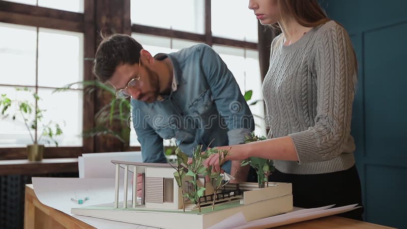 Architect Showing His House Plan To a Client. Stock Video - Video of ...