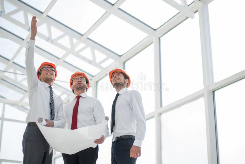 Architect Shows the Customer a New Building Stock Photo - Image of ... Architect Shows the Customer a New Building Stock Photo - Image of ...