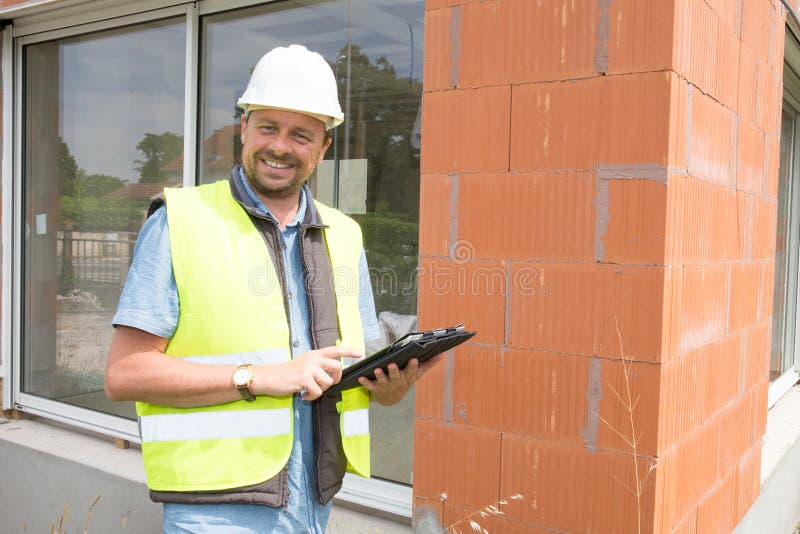 Architect Site Manager on the Construction of a House with Tablet in ...