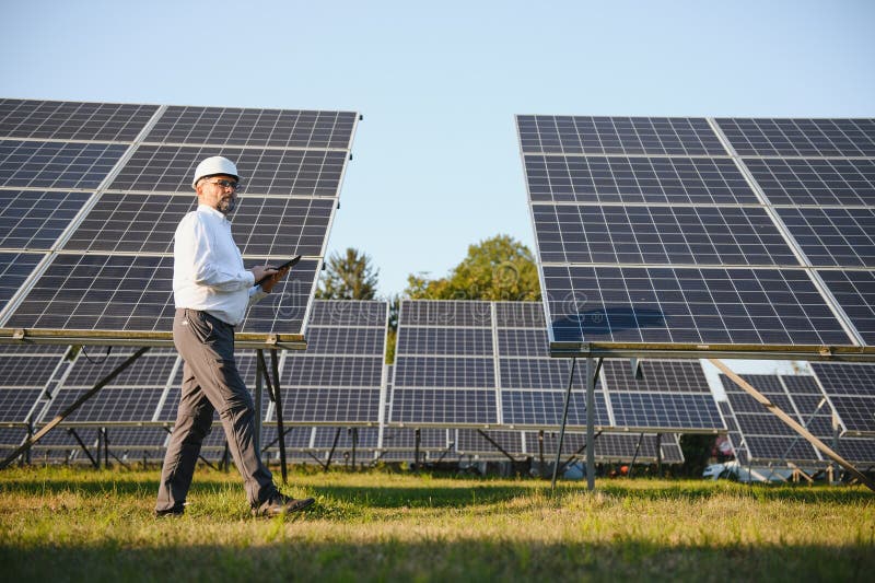 Architect Standing by Solar Panels. Stock Photo - Image of ecological ...