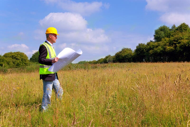 Architect Surveying a New Building Plot Stock Image - Image of plans ...