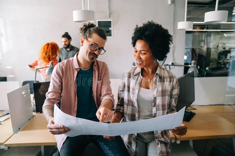 Architect Team Meeting with Blueprint Planning for Construction ...