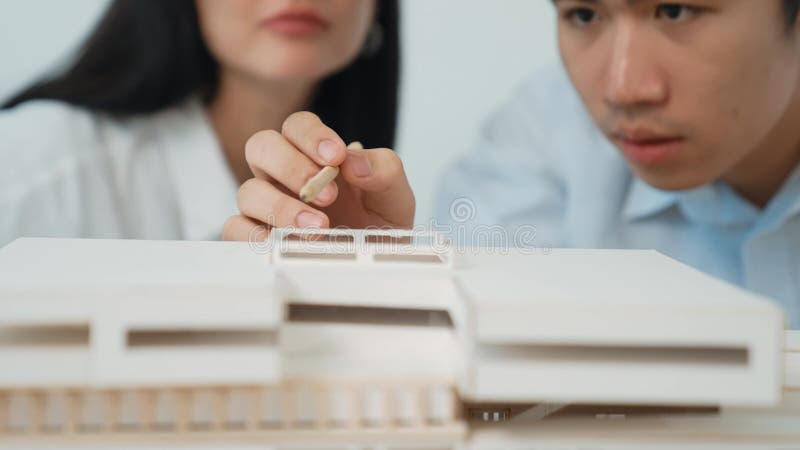Architect Team Using Pencil To Test House Model Durability. Immaculate ...