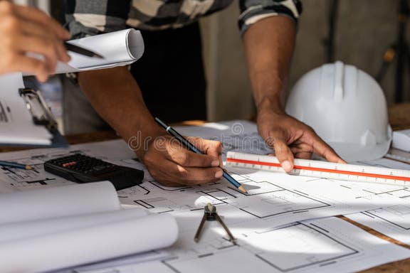 Architect Team Working with Blueprints for Architectural Plan, Engineer ...