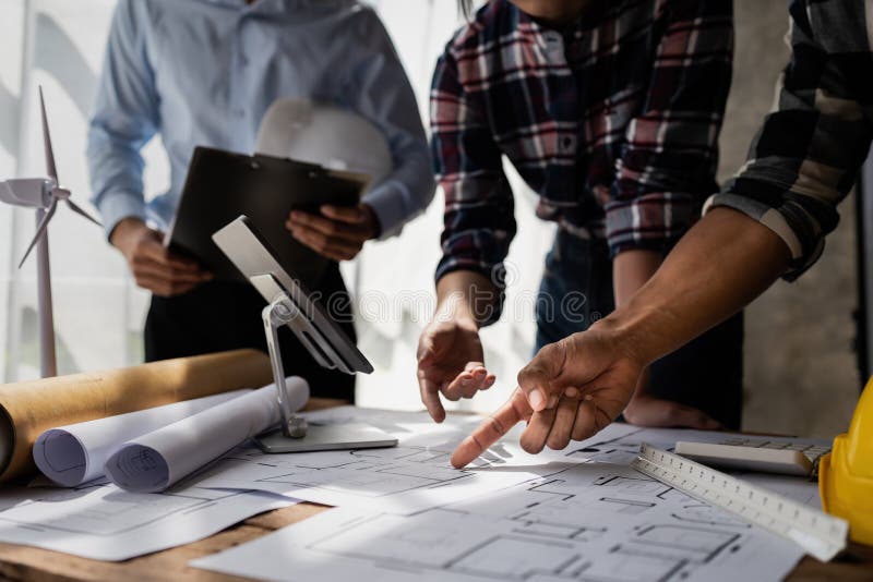 Architect Team Working with Blueprints for Architectural Plan, Engineer ...