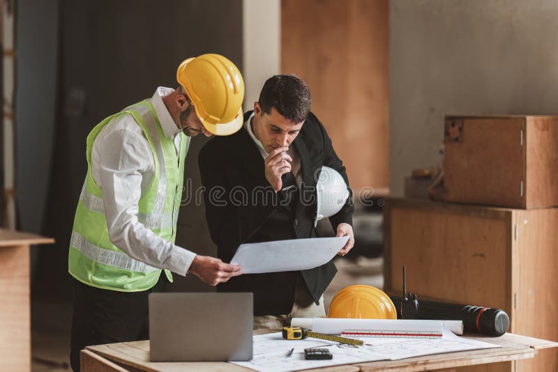 Architect Team Working with Blueprints for Architectural Plan, Engineer ...