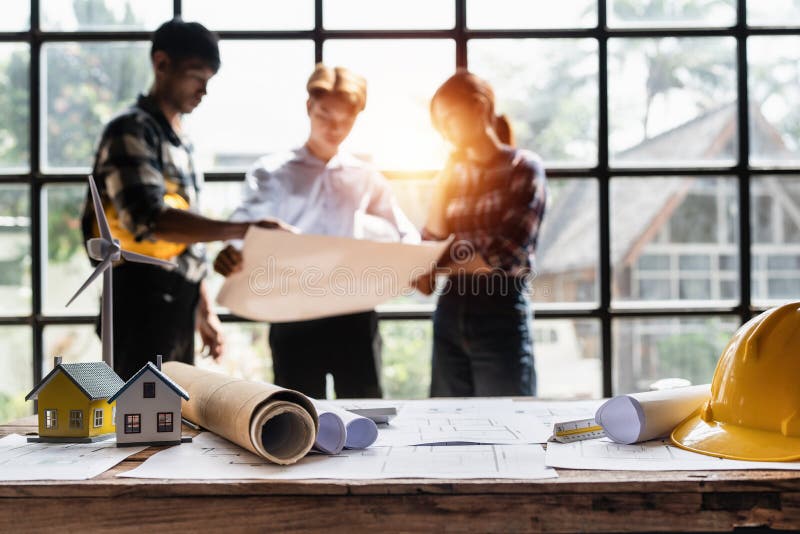 Architect Team Working with Blueprints for Architectural Plan, Engineer ...