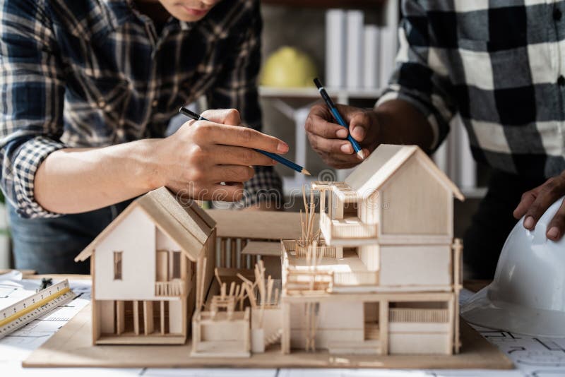 Architect Team Working with Blueprints for Architectural Plan, Engineer ...