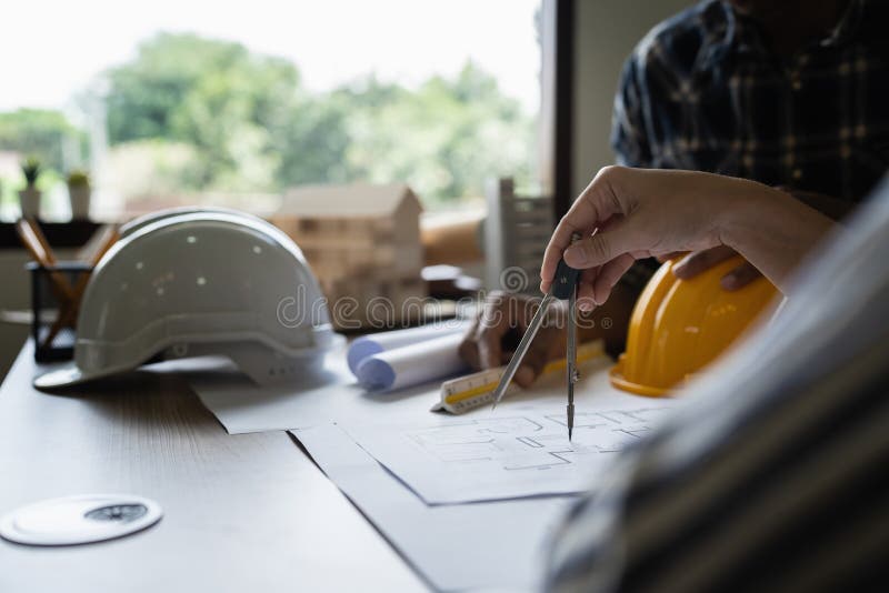 Architect Team Working with Blueprints for Architectural Plan, Engineer ...