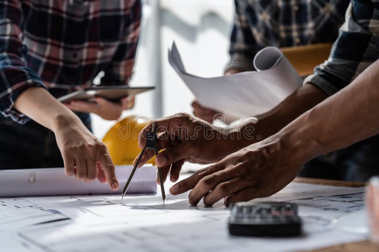 Architect Team Working with Blueprints for Architectural Plan, Engineer ...