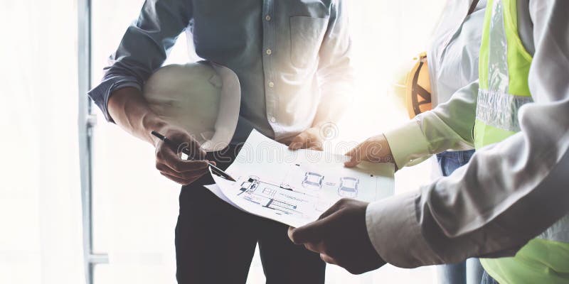 Architect Team Working with Blueprints for Architectural Plan, Engineer ...