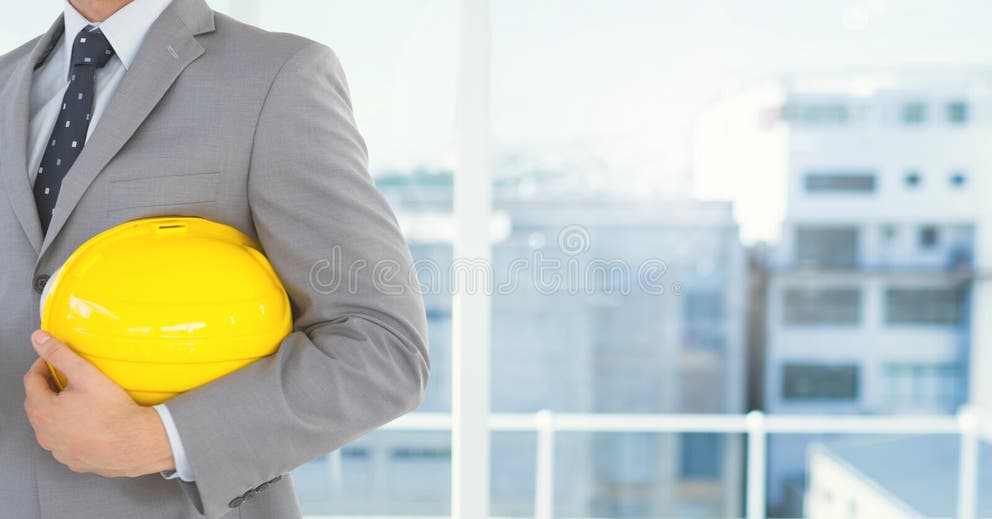 Architect Torso Holding a Cask Against Windows Stock Image - Image of ...