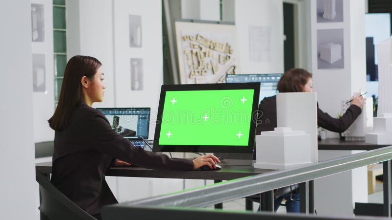 Architect Using Computer with Greenscreen at Workstation Stock Video ...