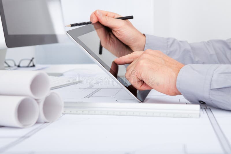 Architect Using Digital Tablet Stock Image - Image of male, hand: 40194789