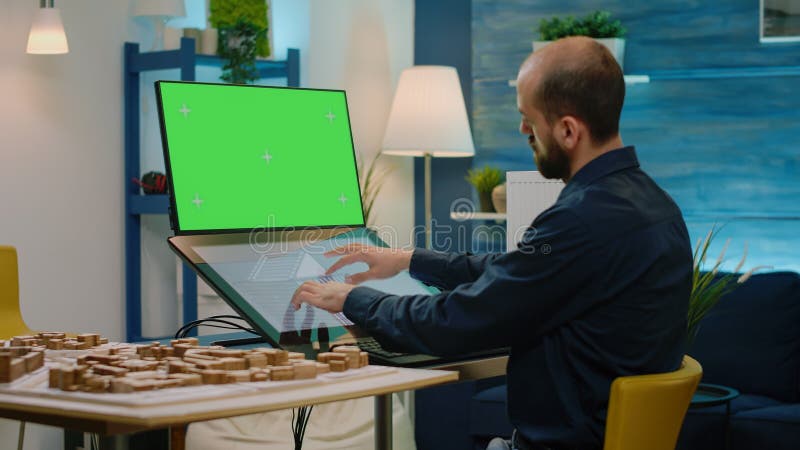 Architect Using Horizontal Green Screen and Building Model Stock Image ...