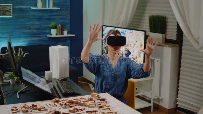Architect Using Vr Glasses for Building Design with Blueprint Stock ...