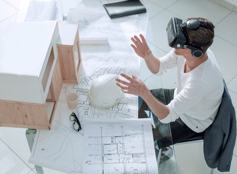 Architect in Virtual Reality Helmet Sitting at the Table Stock Image ...