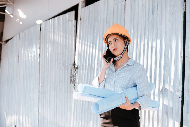 Architect Woman Use Mobile Phone Call with Enginner or Project Manager ...
