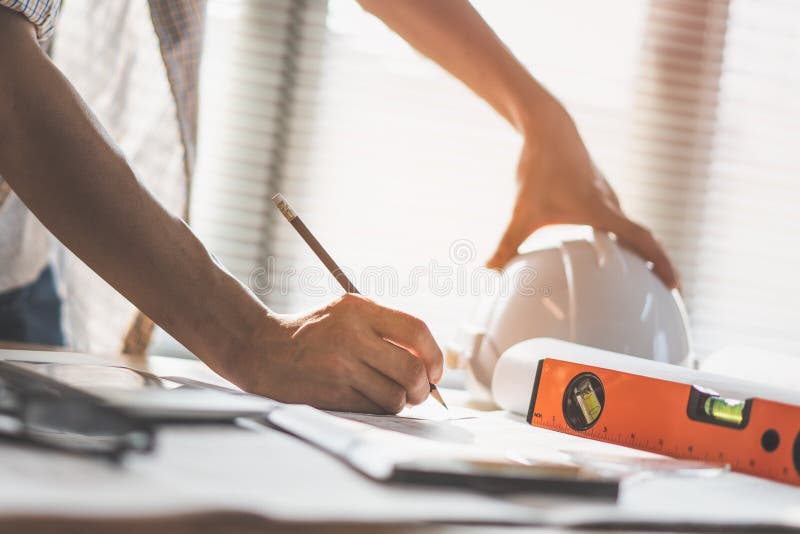 Architect Work Concept. Close Up Hand of Architect Writing on the ...