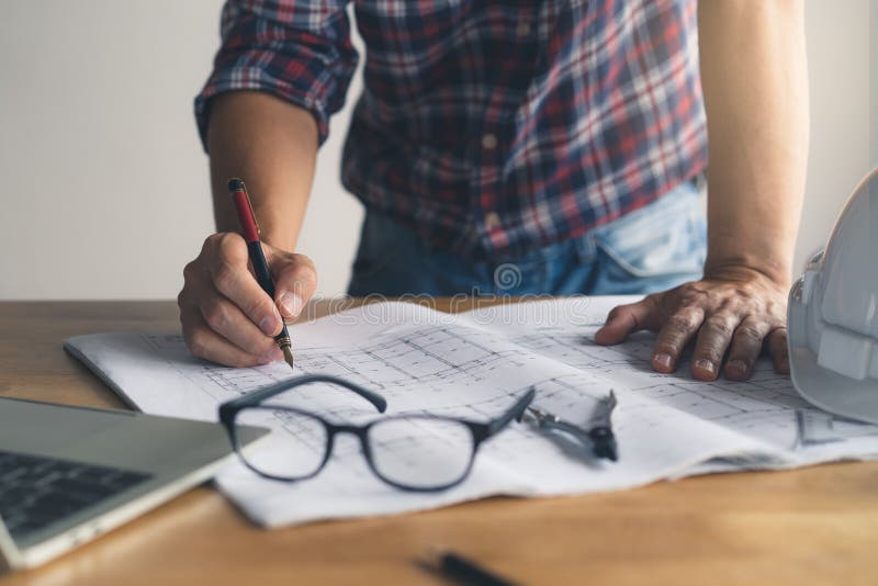 Architect Work Concept. Close Up Hand of Architect Writing on the ...