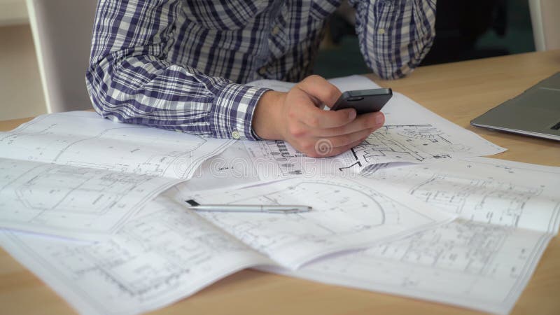 Architect Working with Architectural Document Typing on Cell. Stock ...