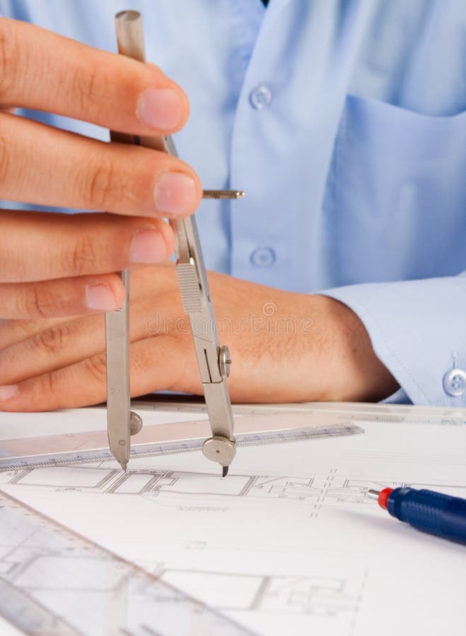 Architect Working on Architectural Plans Stock Photo - Image of hand ...