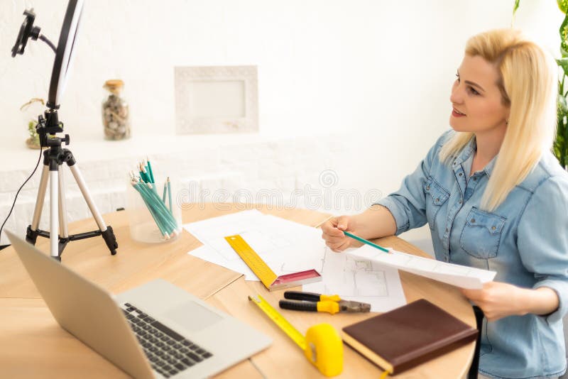 Architect Working on Blueprint. Architects Workplace - Architectural ...