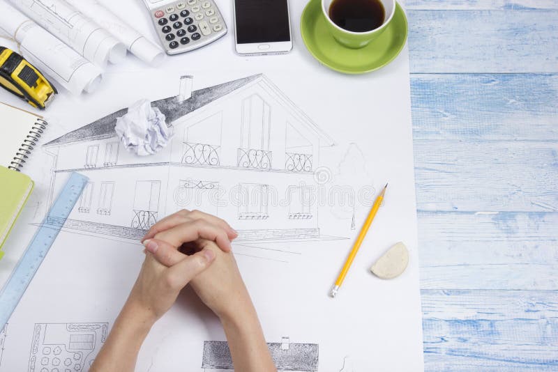 Architect Working on Blueprint. Architects Workplace - Architectural ...