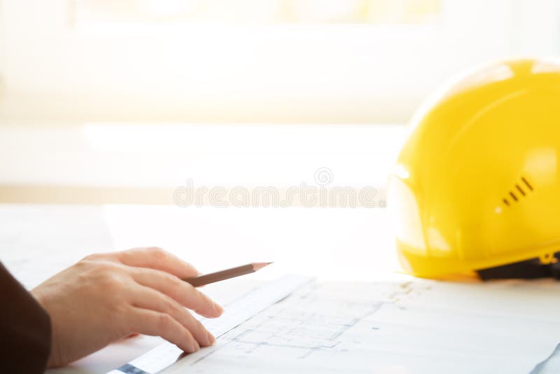 Architect Working on Blueprint, with Architectural Project at ...